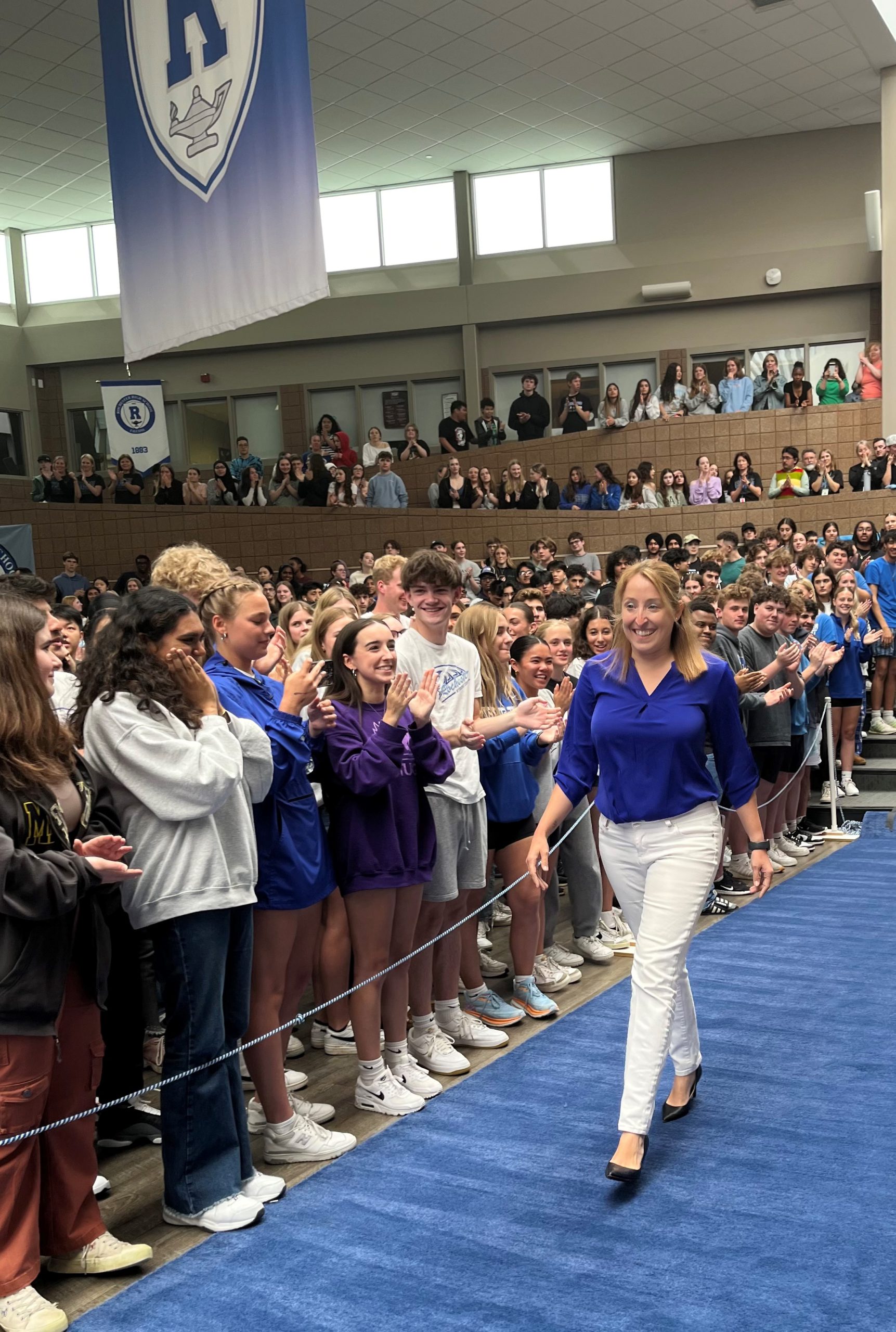 Kelley Cusmano walks in to the Michigan Teacher of the Year award ...