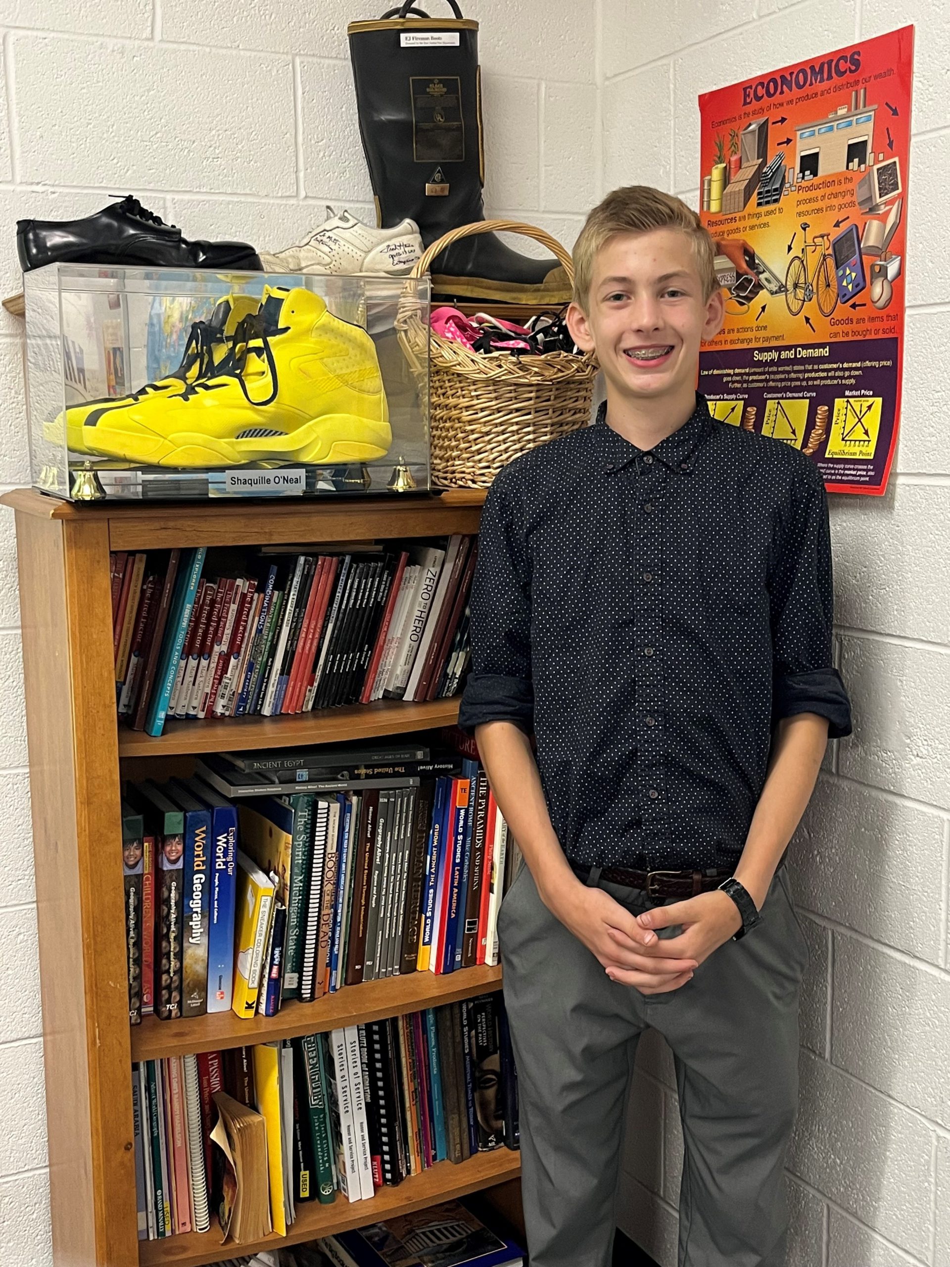8-11 COVER STORY - student with Shaq shoes - Michigan Education Association